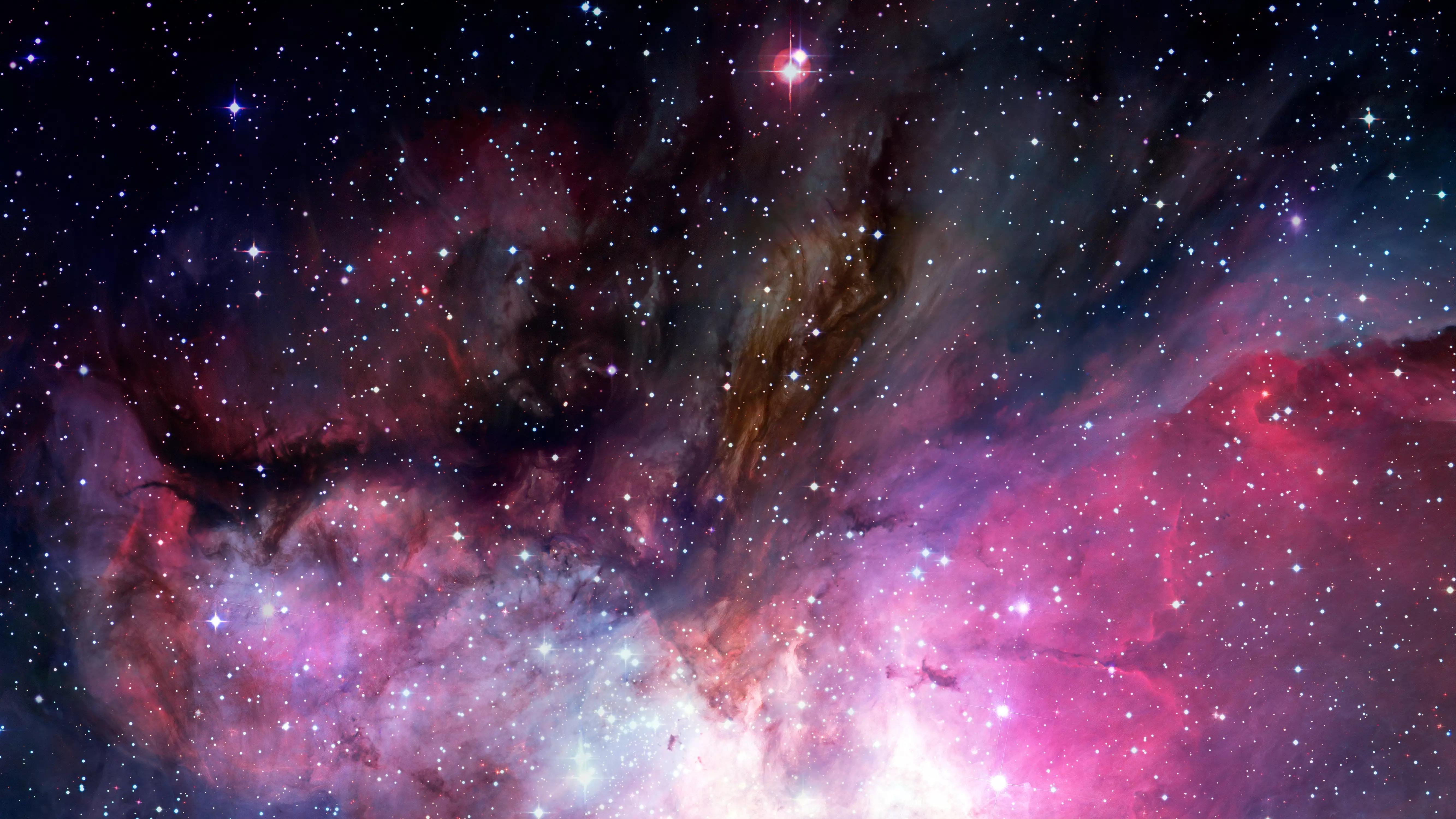 Latar ruang tanpa wates sareng nebula sareng béntang. Unsur gambar ieu dilengkepan ku NASA