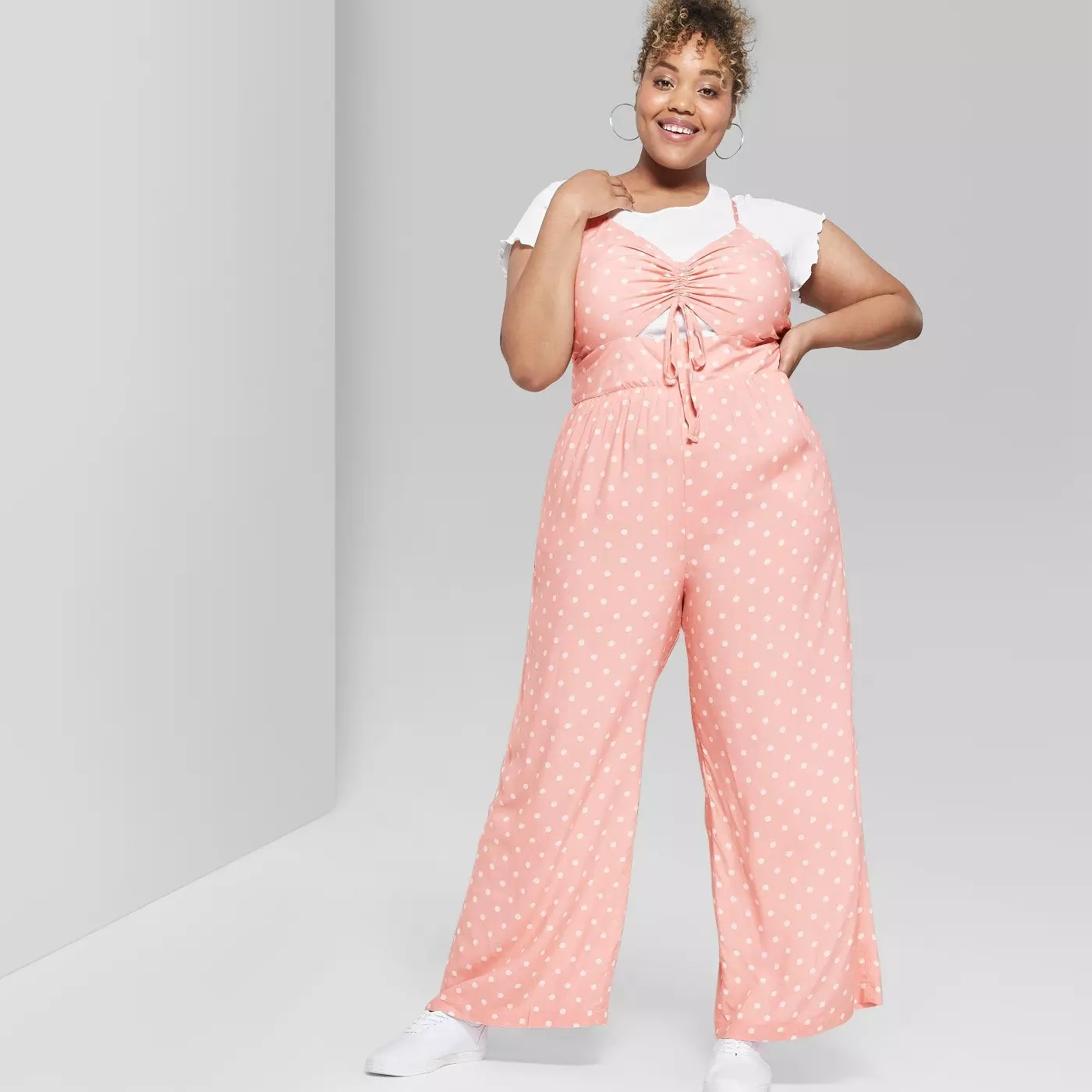 Akụkọ ifo anụ ọhịa Polka Dot Plus Size Strappy Ruched Front Cutout Jumpsuit